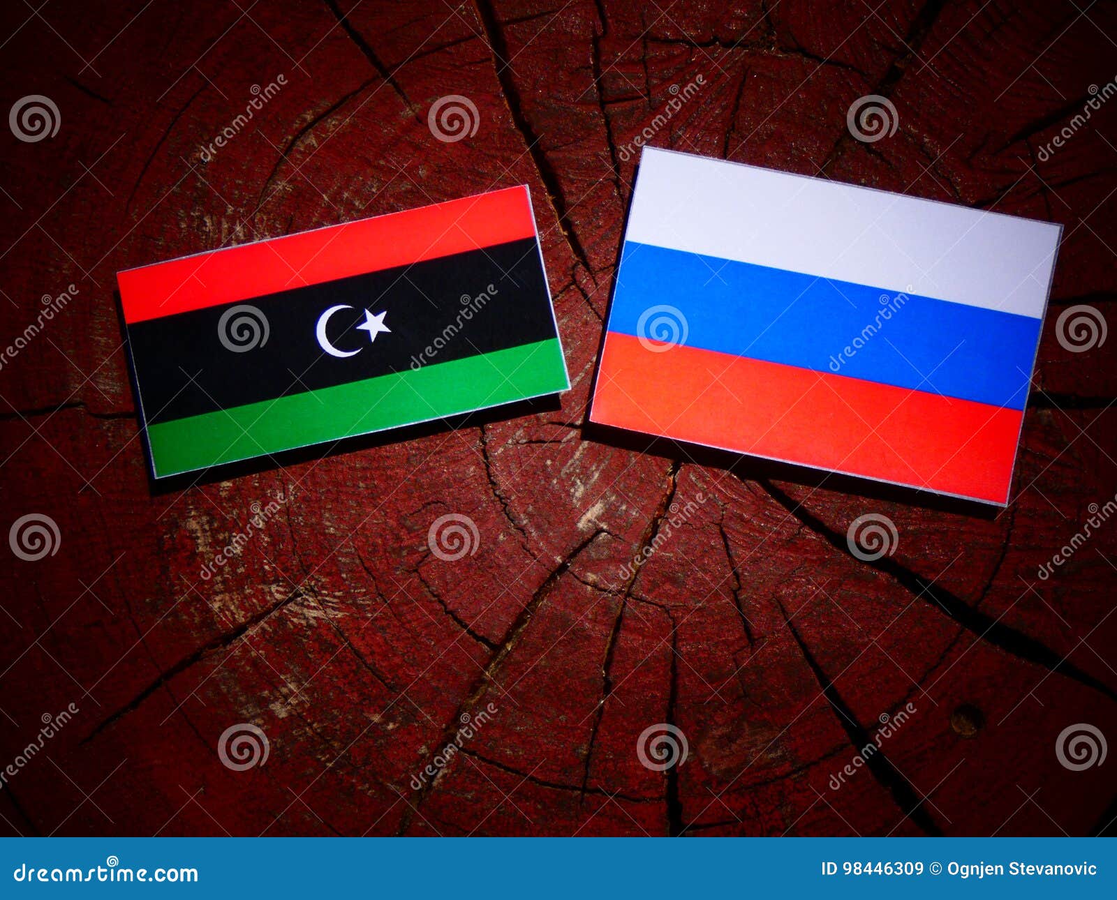Libyan Flag with Russian Flag on a Tree Stump Stock Image - Image of ...