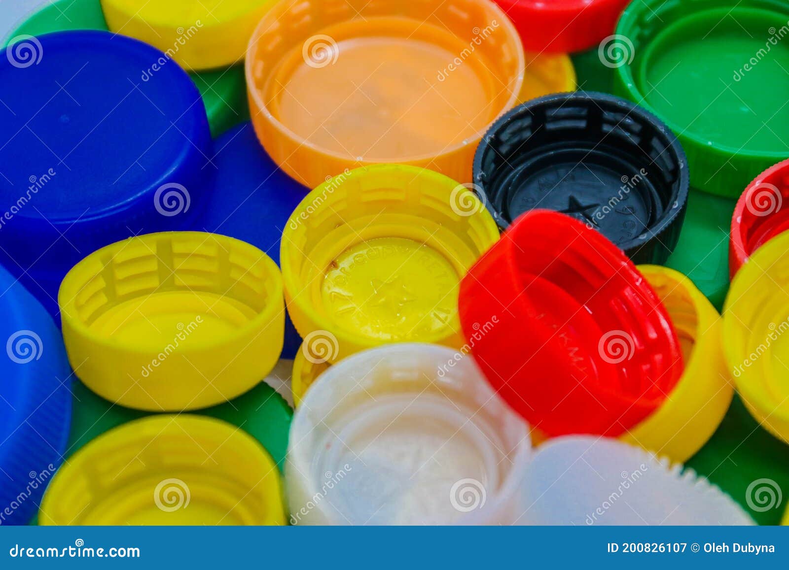 Plastic Lids of Different Colors on a White Background Stock Image ...