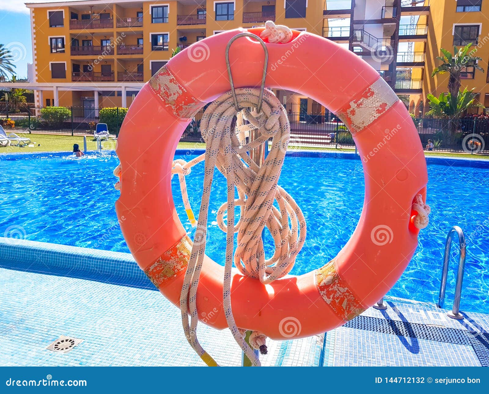 Life Buoy with Rope Prepared for Use in the Pool Stock Photo - Image of ...