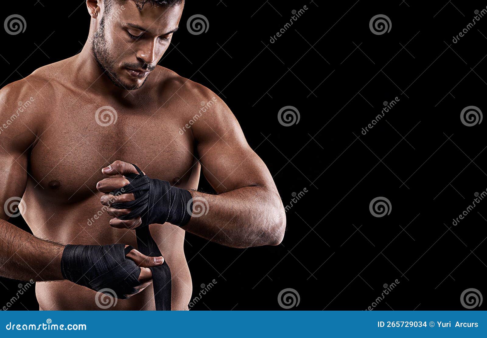 The Life of a Fighter. Studio Shot of a Young Boxer Isolated on Black ...