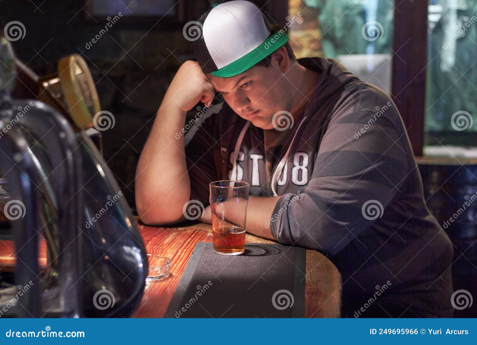 Life Getting You Down. a Young Man Looking Lonely at the Bar. Stock ...