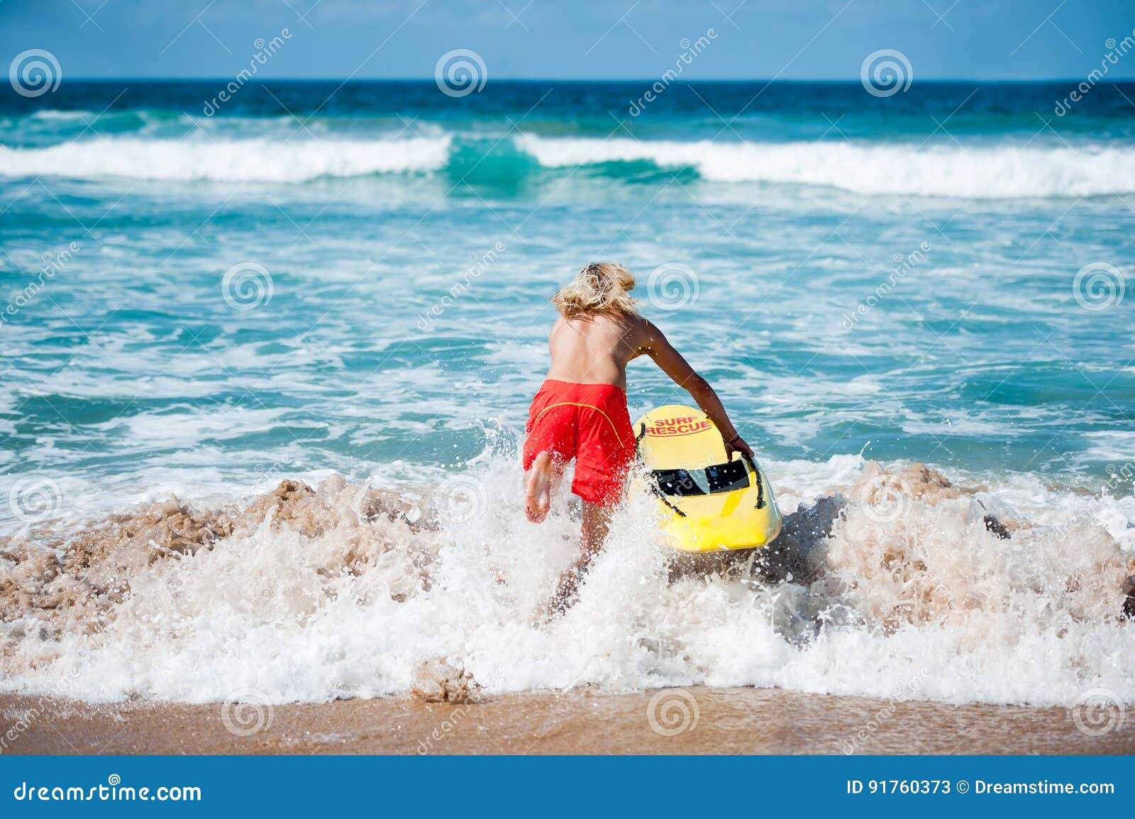Life Guard Running into the Ocean Stock Image - Image of australian ...