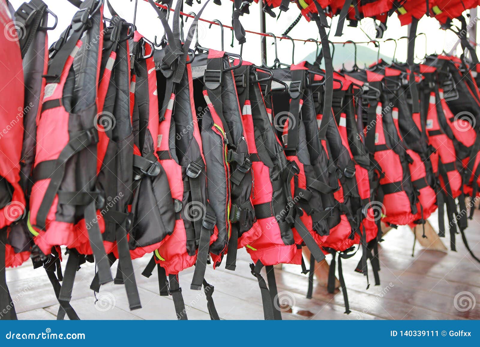Life Jackets Safety Equipment Hanging in Row Stock Image - Image of ...