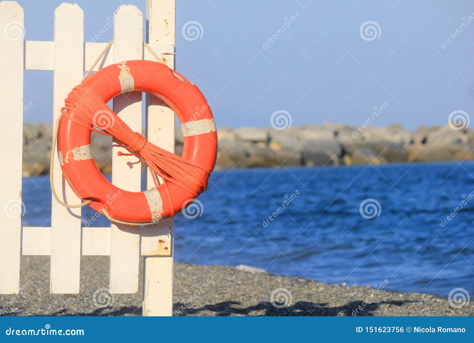 Life Preserver in Front of the Sea Stock Photo - Image of summer, gate ...