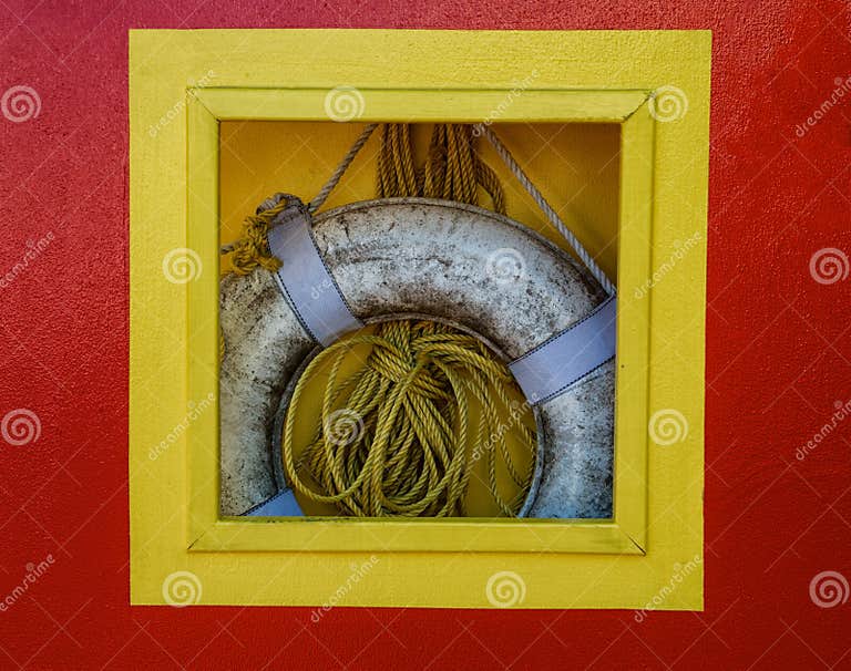 Life Preserver and Rope Hanging in Box on Dock Stock Image - Image of ...
