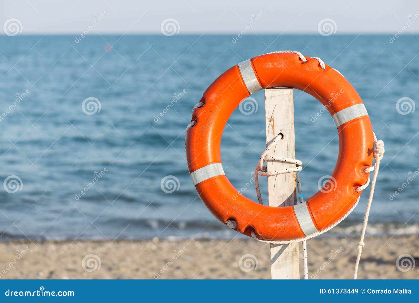 Life Preserver on Sandy Beach Stock Image - Image of beach, saver: 61373449