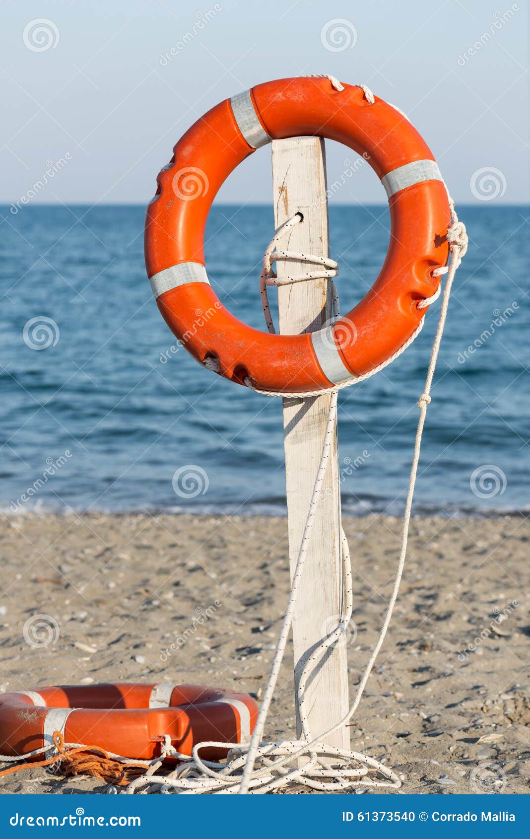 Life Preserver on Sandy Beach Stock Photo - Image of icon, coast: 61373540