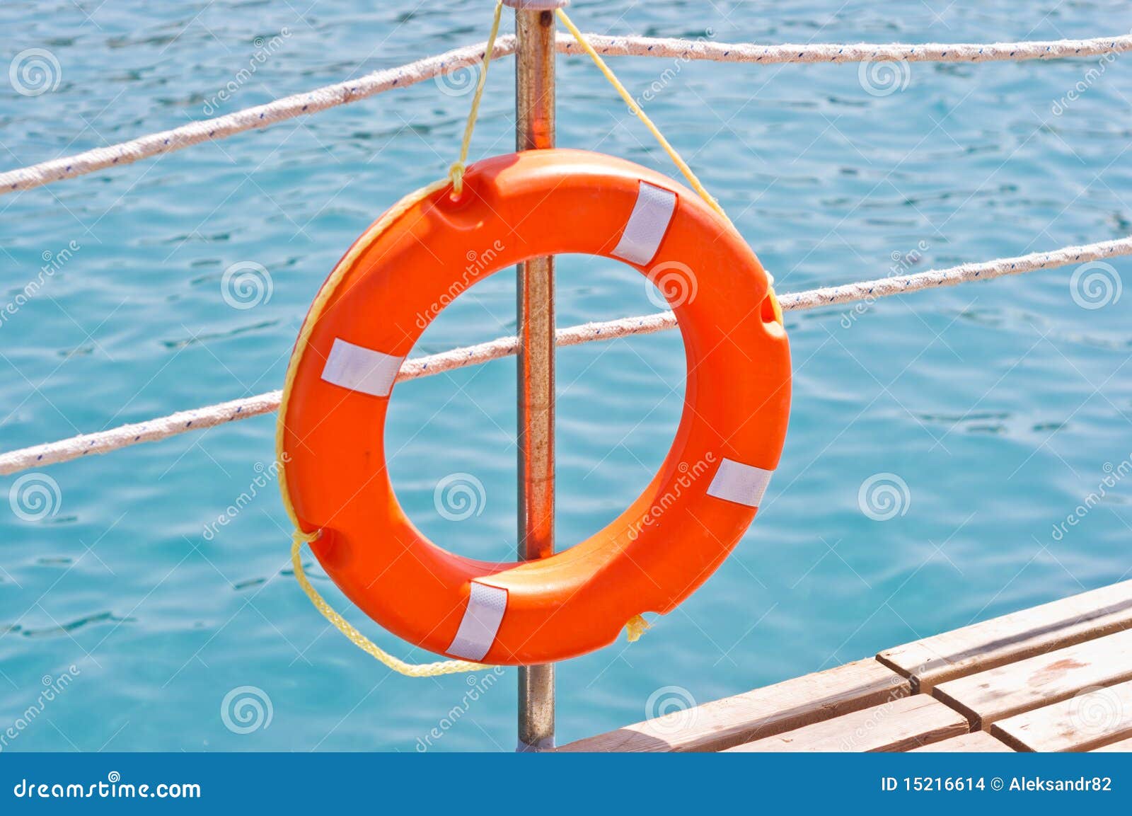 Life ring on dock stock photo. Image of bright, pier - 15216614