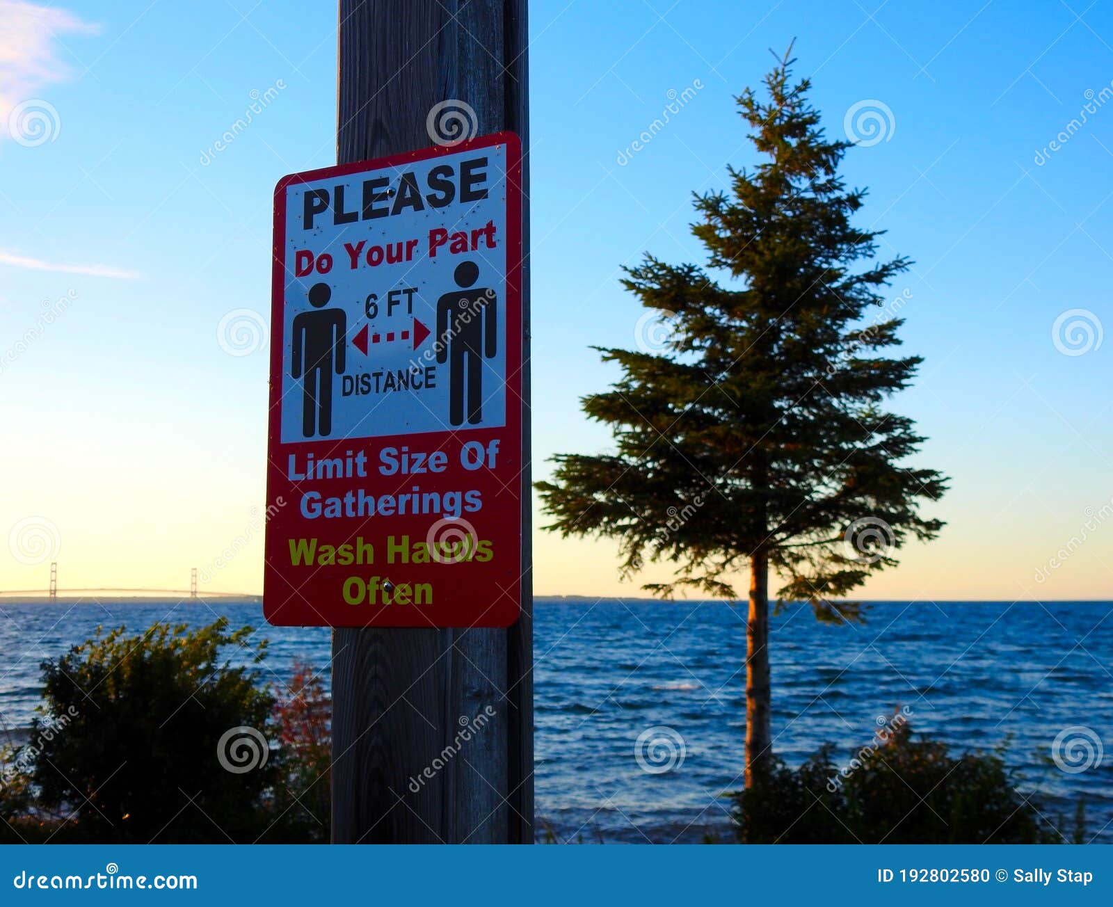 Life Saving Ring on Post with Sign Stock Photo - Image of warning, ring ...