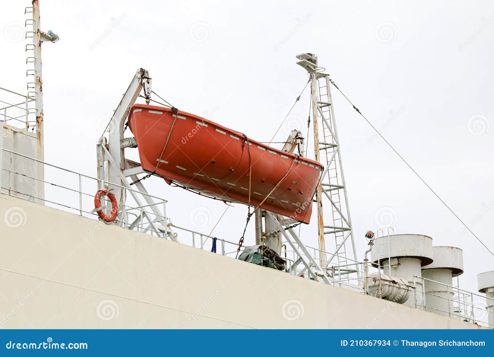 A Lifeboat Hangs on a Sling on a Cargo Ship Stock Photo - Image of ...