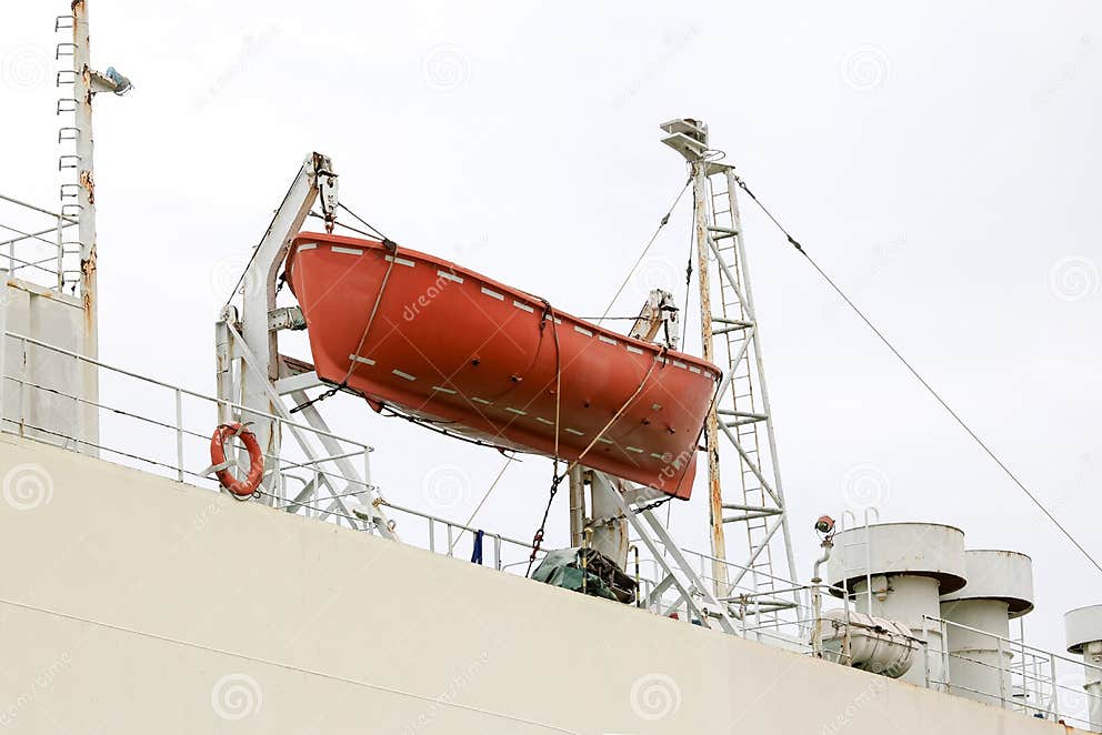 A Lifeboat Hangs on a Sling on a Cargo Ship Stock Photo - Image of ...