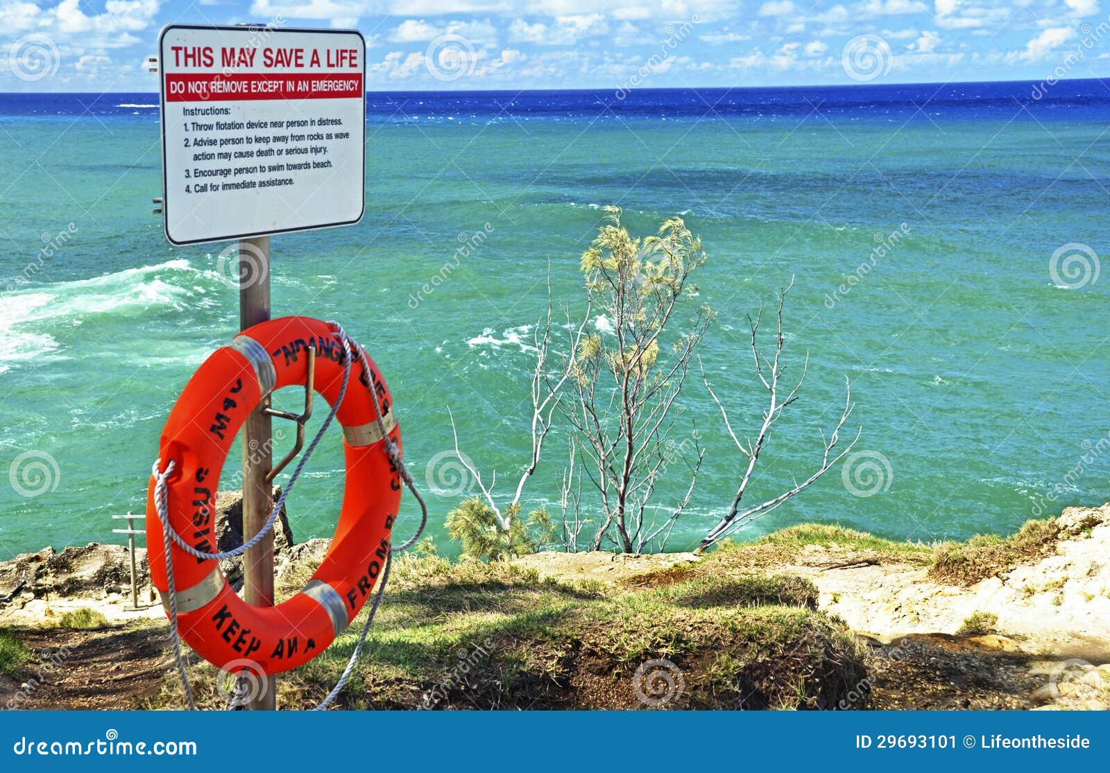 Lifebuoy Flotation Device & Instruction Sign at Seaside Stock Image ...