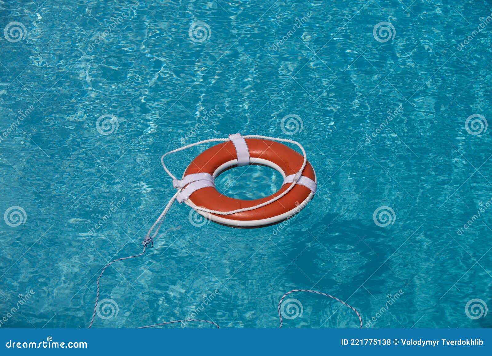 Lifebuoy Pool Ring Float on Blue Water. Stock Photo - Image of ...