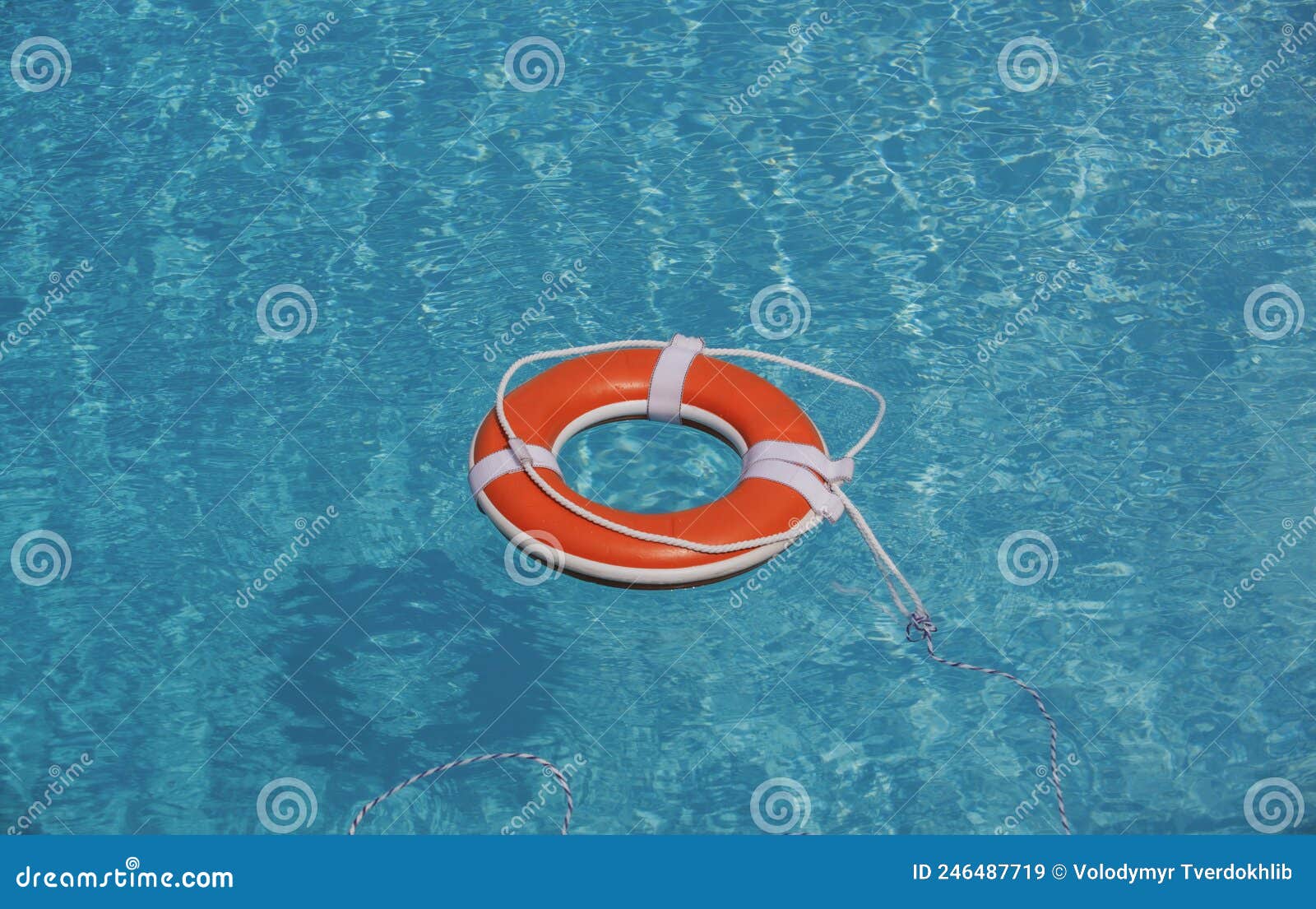 Lifebuoy Pool Ring Float on Blue Water. Stock Image - Image of ...