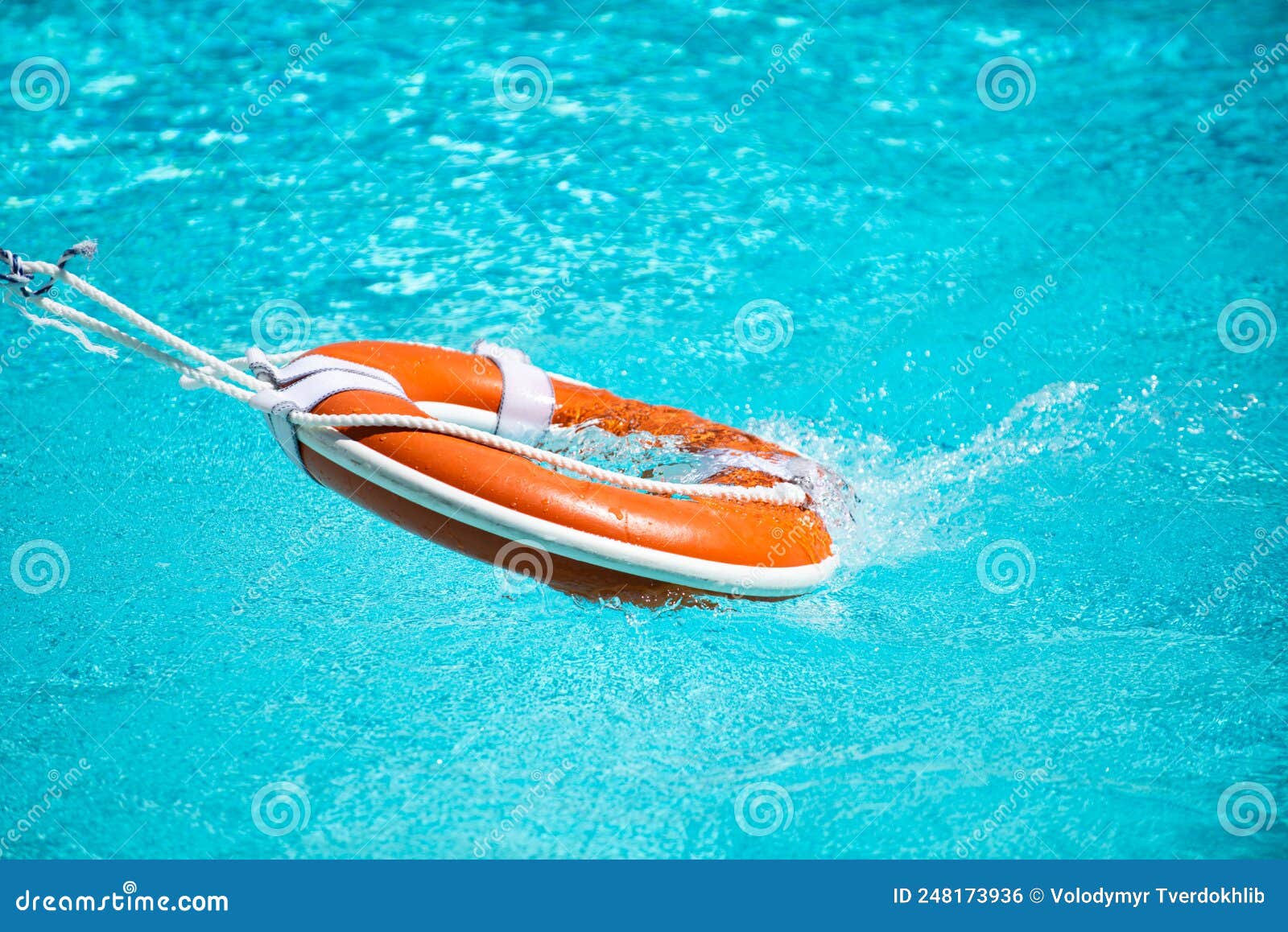 Lifebuoy Pool Ring Float on Blue Water. Stock Photo - Image of surface ...