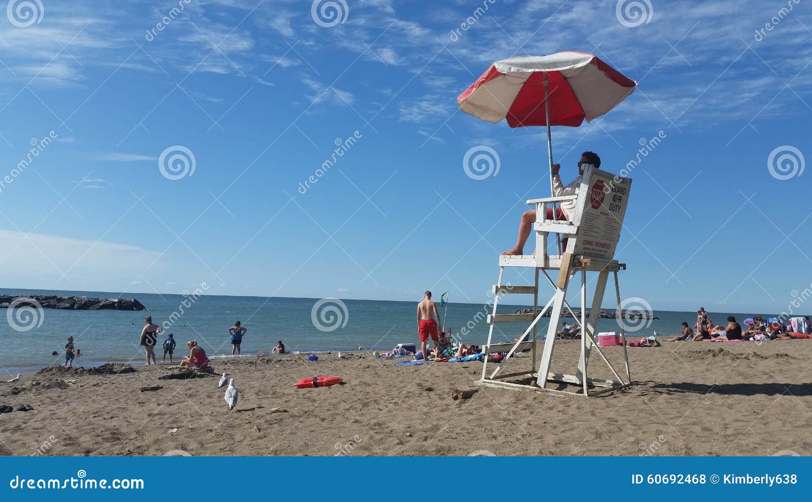 A lifeguard on the beach editorial stock photo. Image of summer - 60692468
