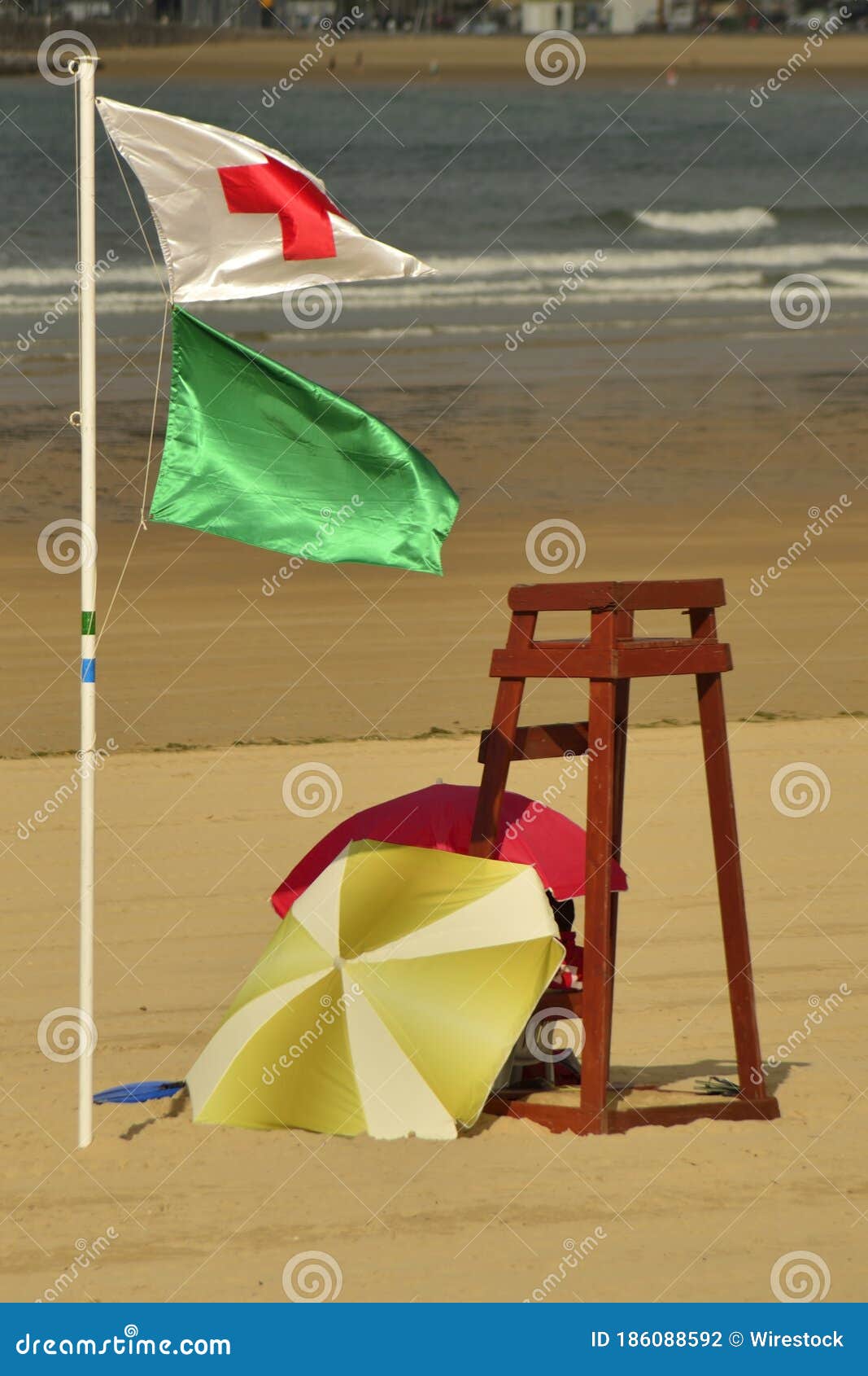 Lifeguard Chair and Flags at an Empty Beach Editorial Photography ...
