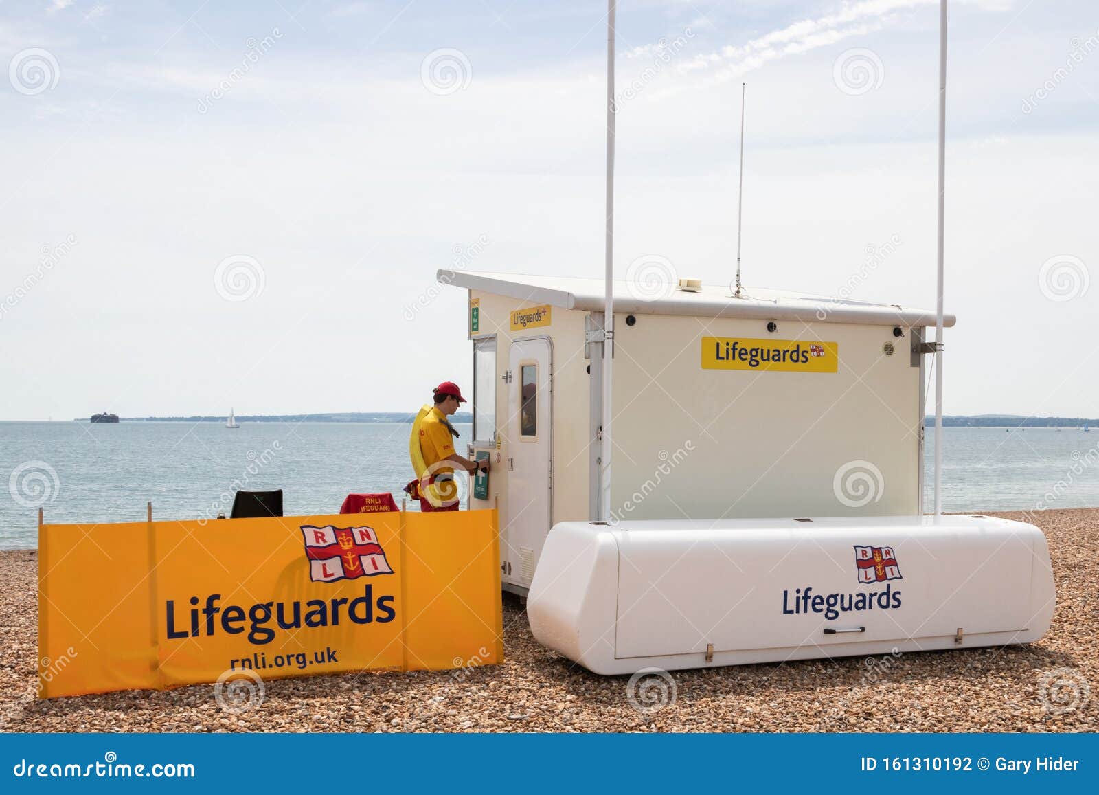 A Lifeguard Entering a Lifeboat Station Editorial Photography - Image ...