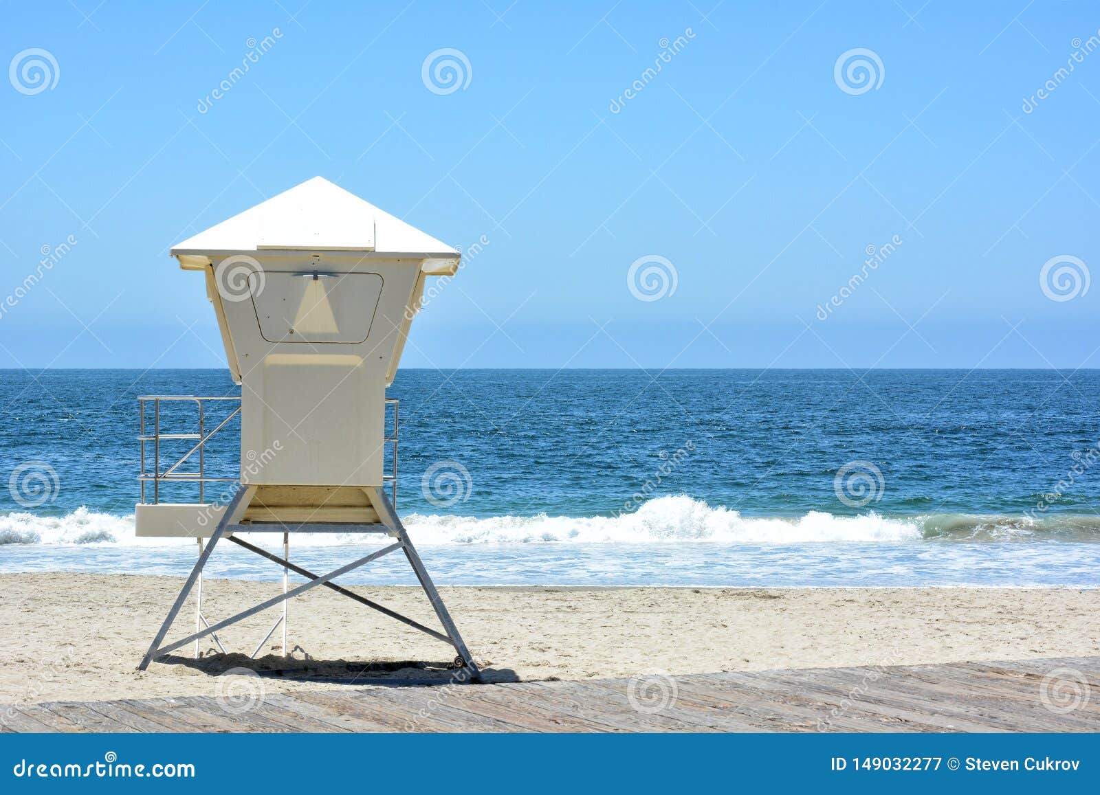Lifeguard Stand on a Beach with the Ocean and Waves Stock Image - Image ...