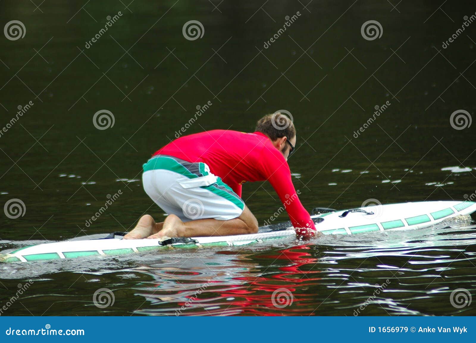 Lifeguard on Surfboard in Lake Stock Image - Image of lake, watchful ...