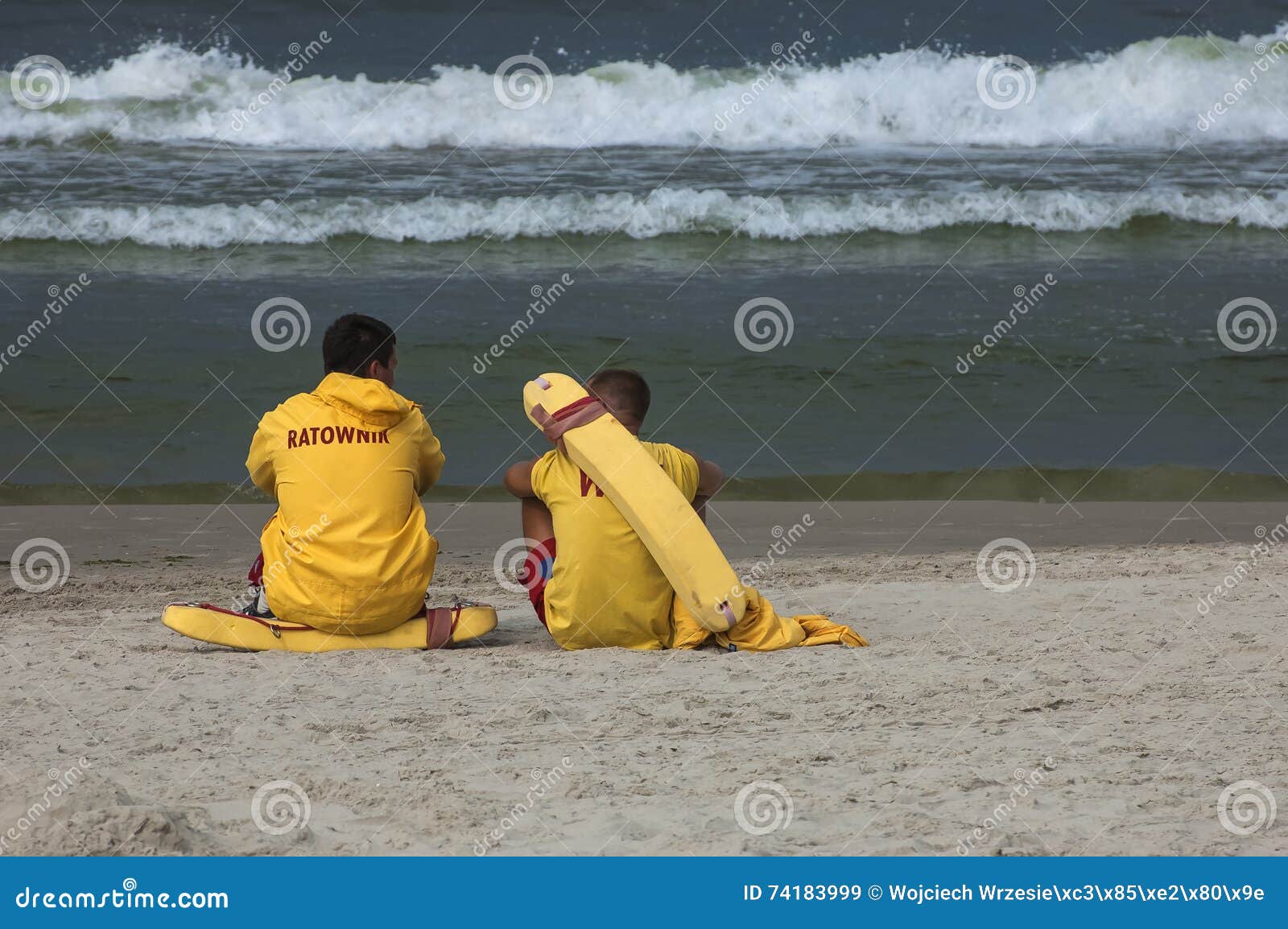 Lifeguards on the beach editorial stock image. Image of beach - 74183999
