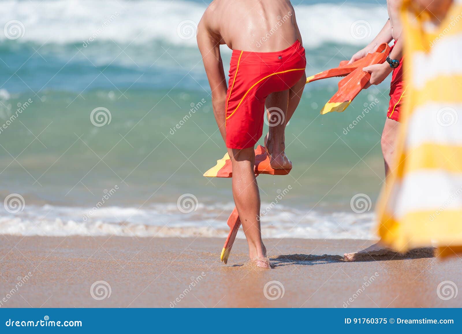 Lifeguards Getting Ready for an Ocean Rescue Stock Image - Image of ...