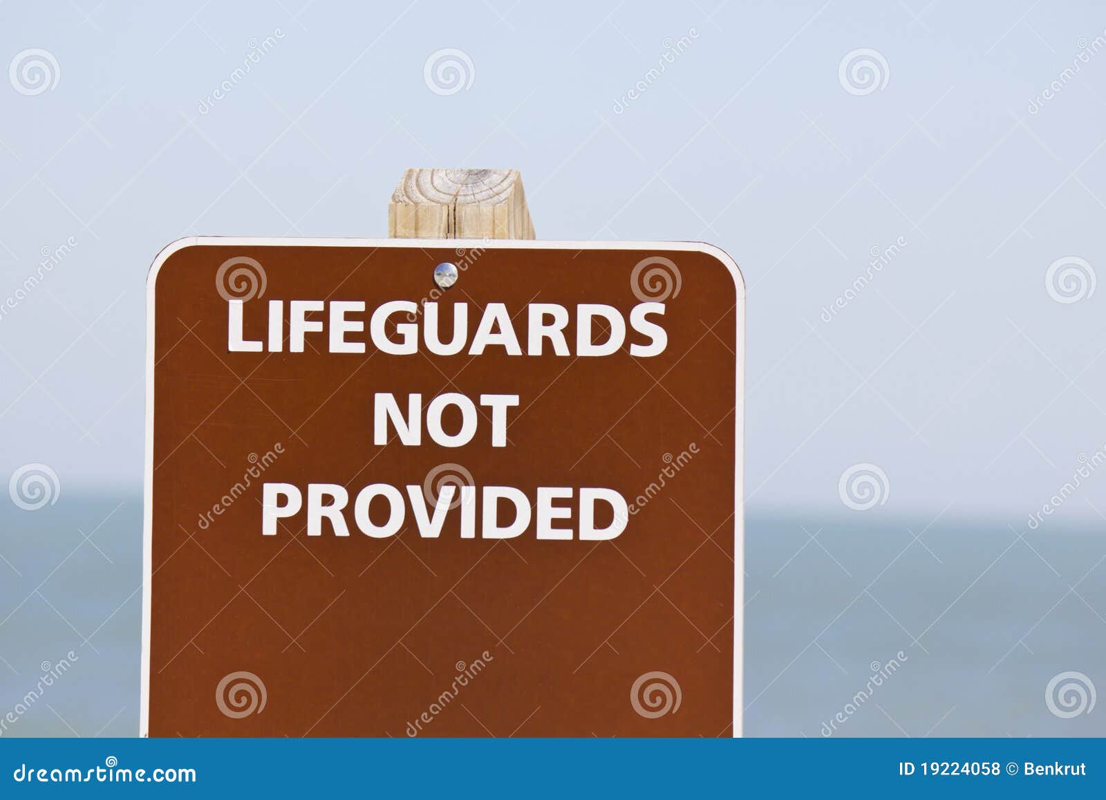 Lifeguards Not Provided Sign Stock Photo - Image of safety, brown: 19224058