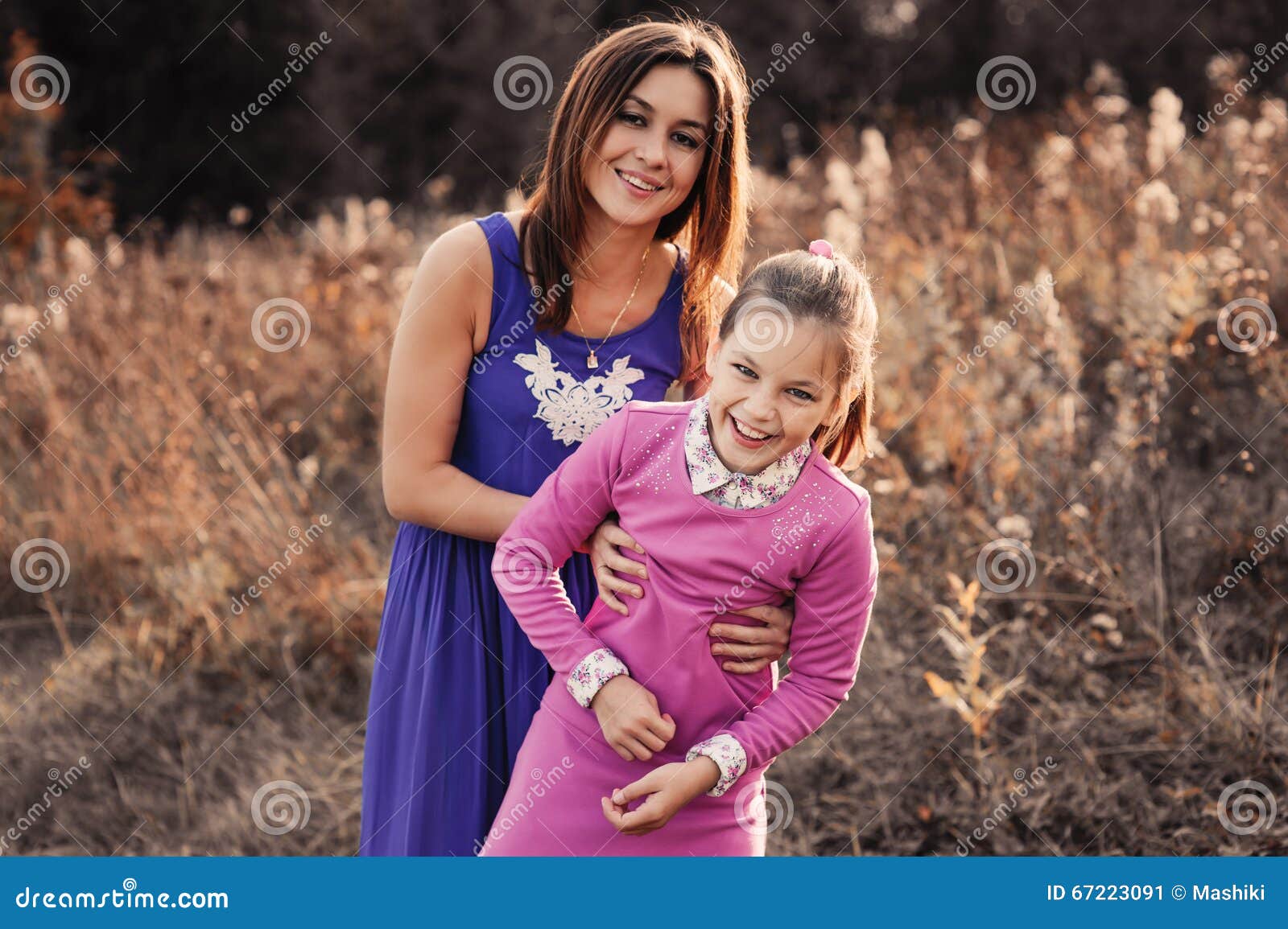 Lifestyle Capture Of Happy Mother And Preteen Daughter Having Fun