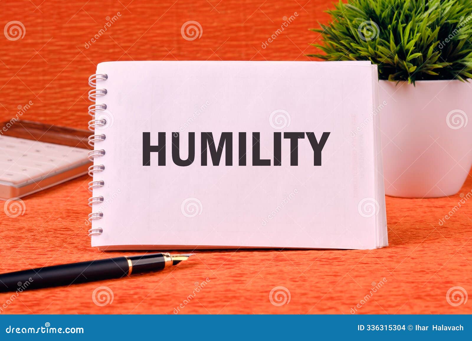 Lifestyle Concept. HUMILITY Word on a Blank Notepad Page on an Orange ...