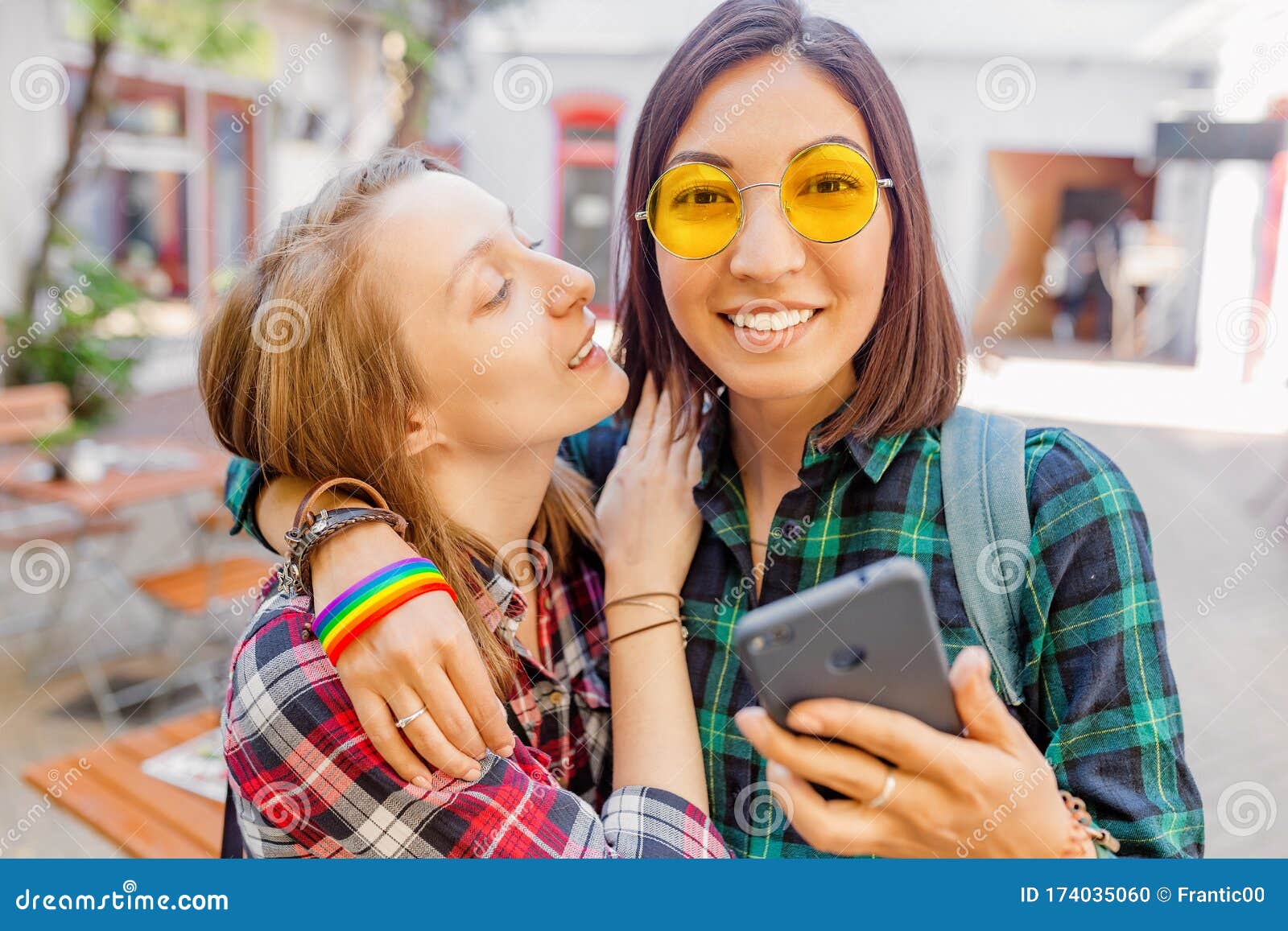 Selfie Portrait Of Two Young Positive Hipster Woman Having Fun And