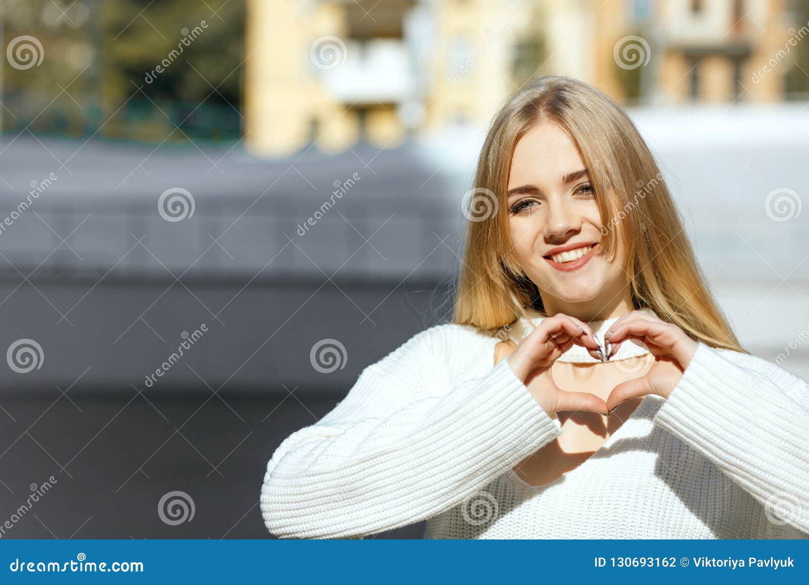 Lifestyle Shot Gorgeous Blonde Girl In White Knitted Sweater Ma Stock