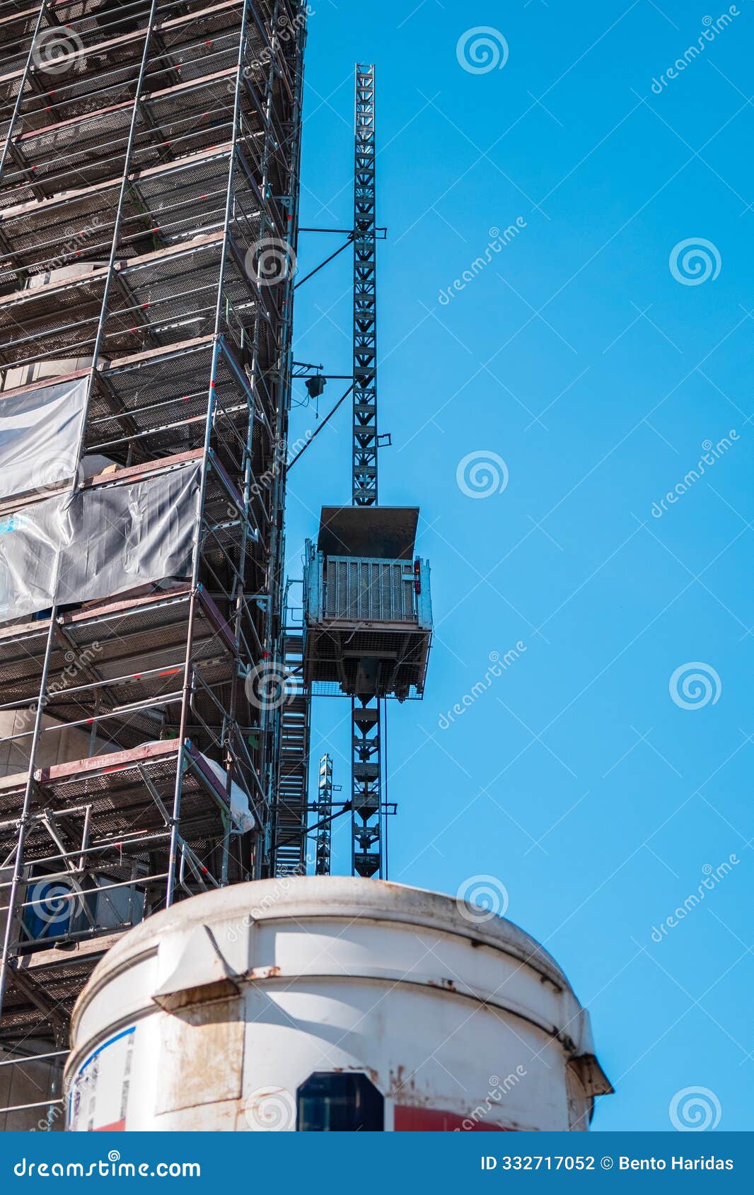 Lift on the Facade of a Building Construction Site Along Side the ...