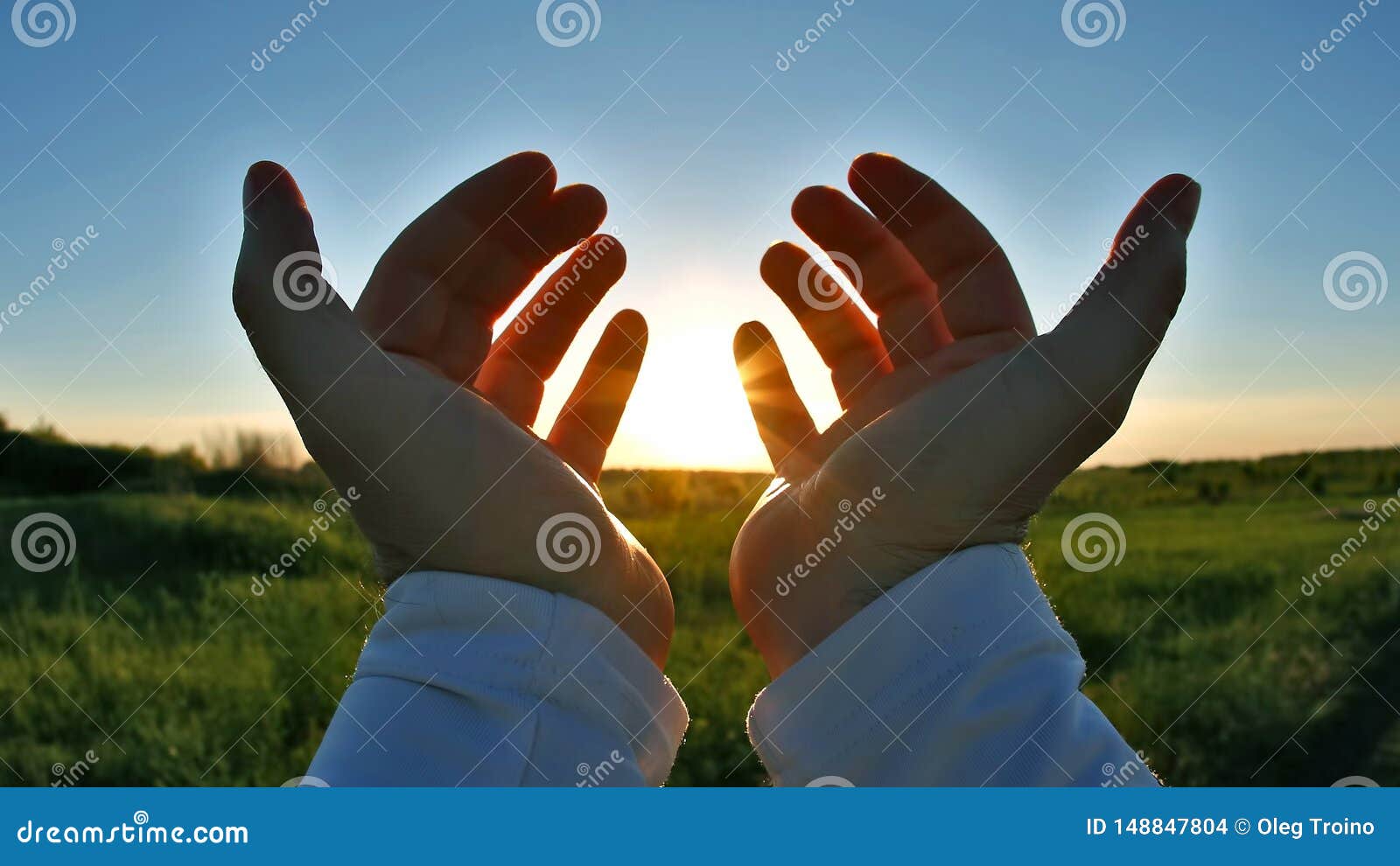 Lifted Up Hands in the Background of the Sunset Stock Photo - Image of ...