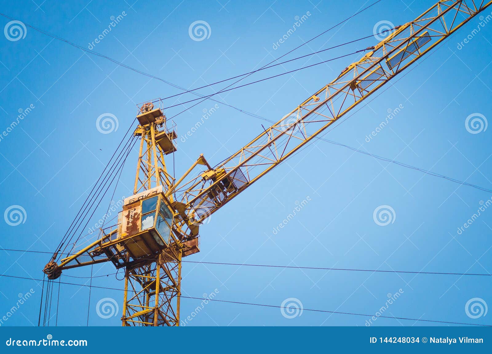 Lifting construction crane stock photo. Image of house - 144248034