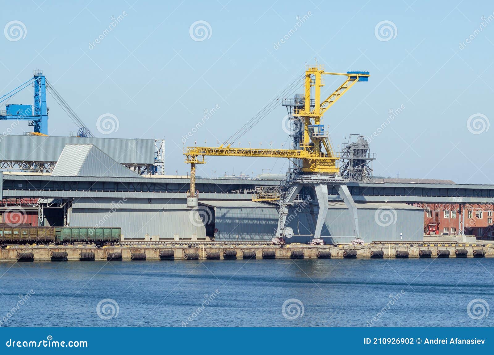 Lifting Harbor Cranes and Railway Wagons in the Cargo Seaport Editorial ...