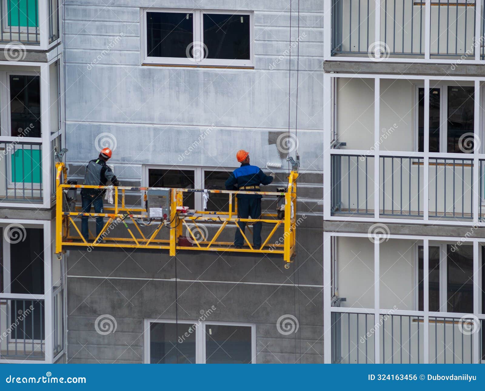 Lifting Platform for Construction Workers Working on the Facade of a ...