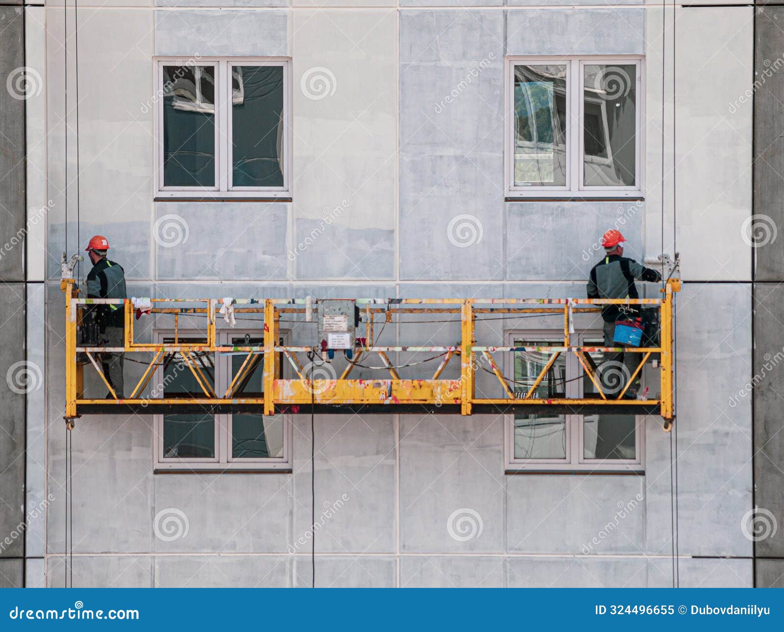 Lifting Platform for Construction Workers Working on the Facade of a ...