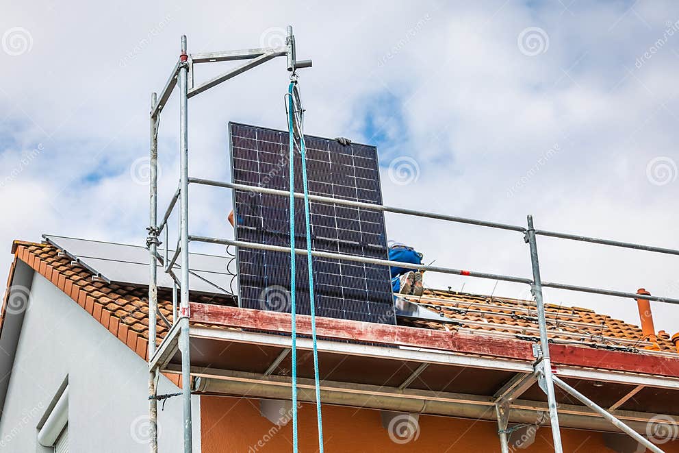 Lifting Solar Panels Using Pulley. Installing Solar Panels on a Roof ...
