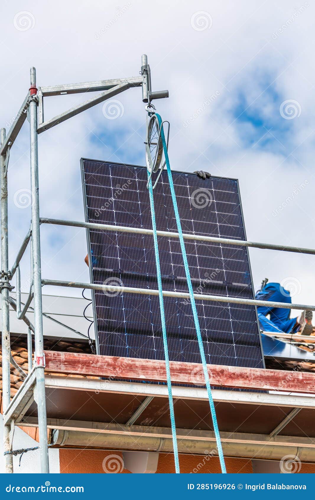 Lifting Solar Panels Using Pulley. Installing Solar Panels on a Roof ...