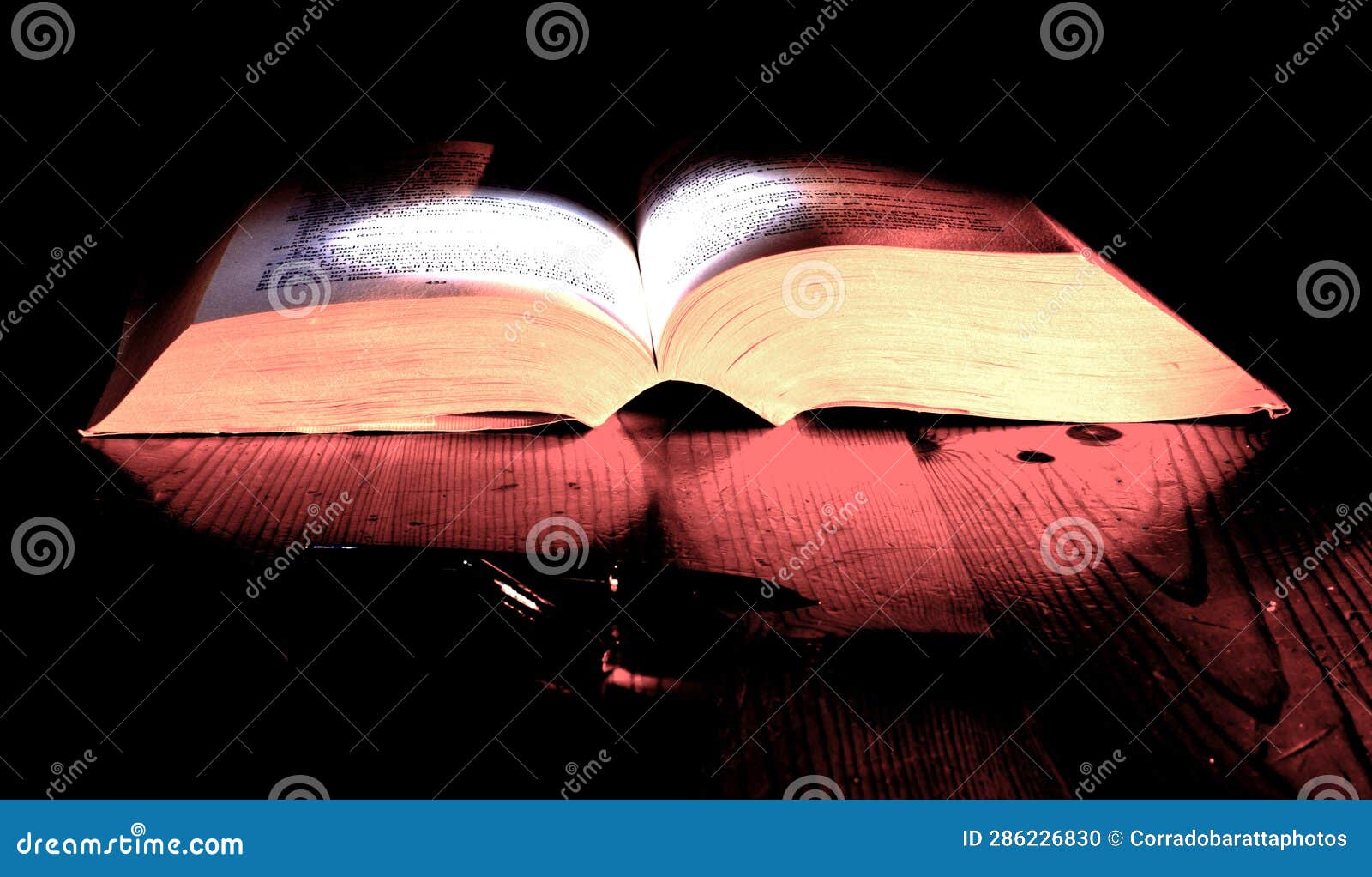 The Light on Above an Open Book in the Night Stock Photo - Image of ...