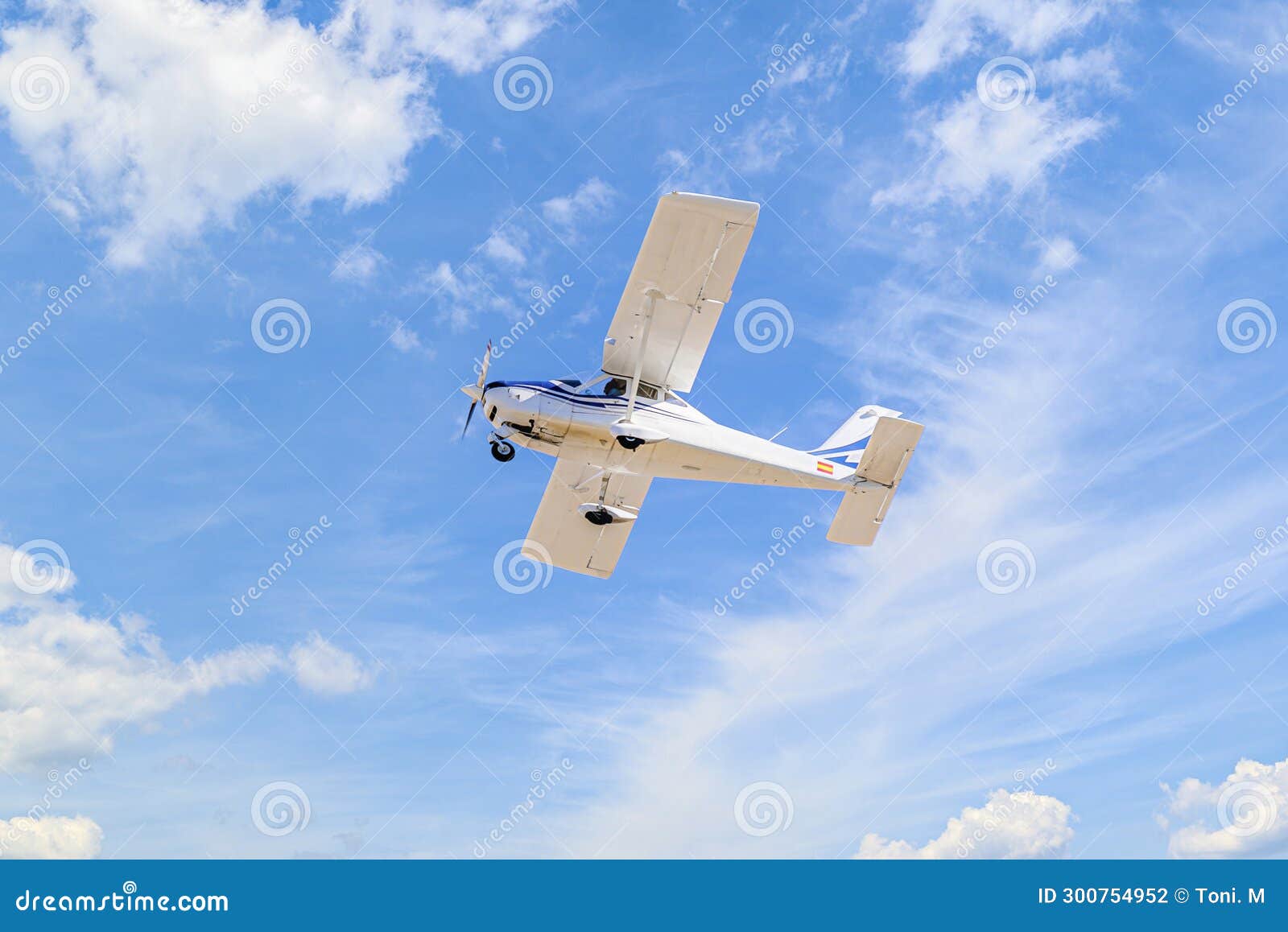 Light Aircraft Flying Over Blue Sky Stock Photo - Image of takeoff ...