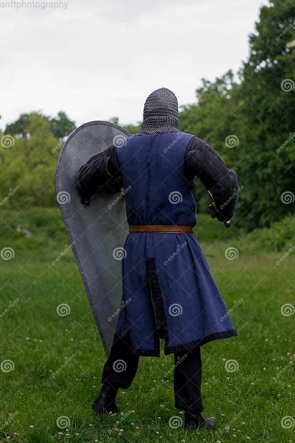 Light Armor Knights Standing Backwards, Shield in Hand Stock Image ...