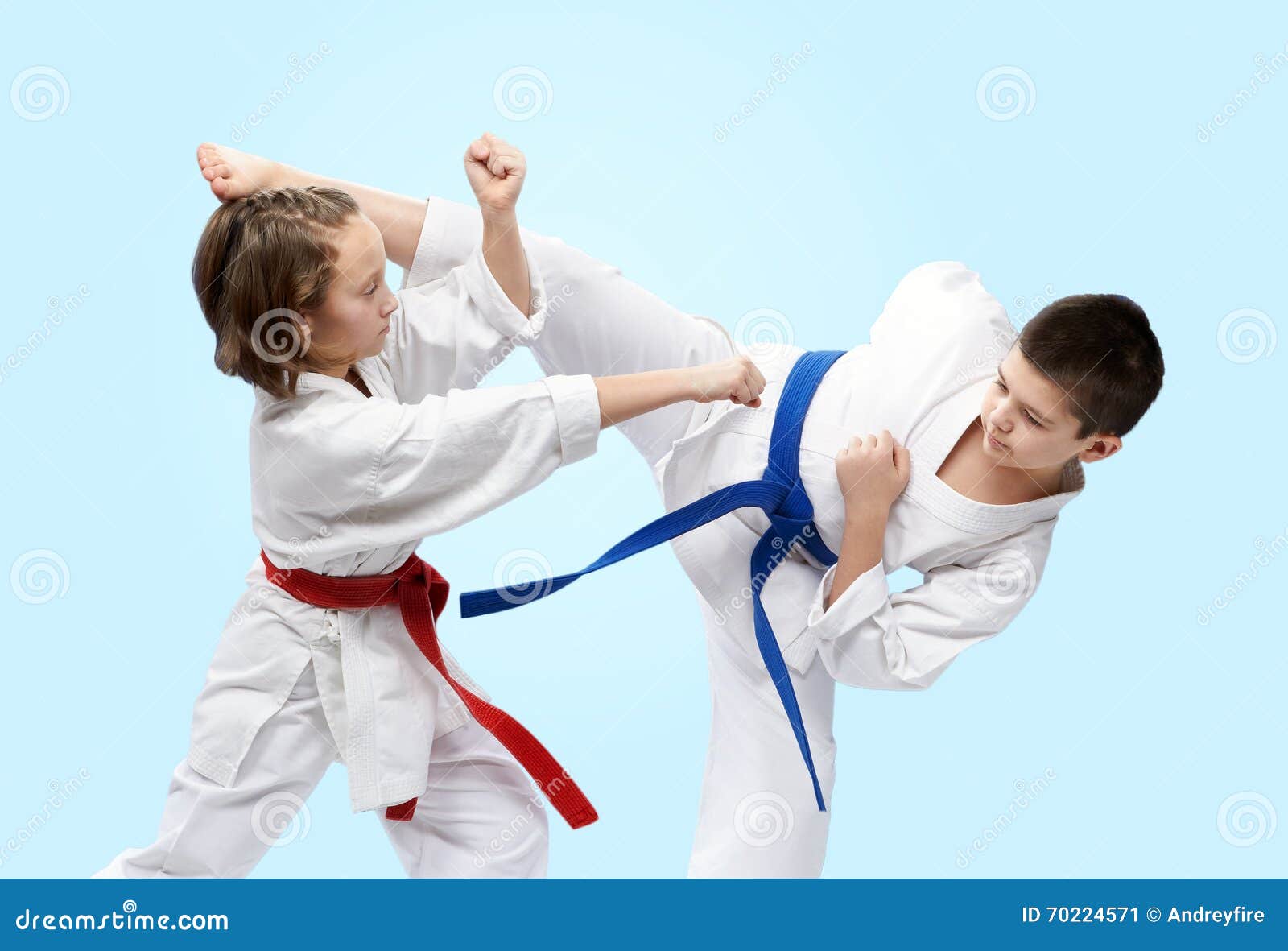 On a Light Background Athletes Train Blocks and Kicks of Karate Stock ...