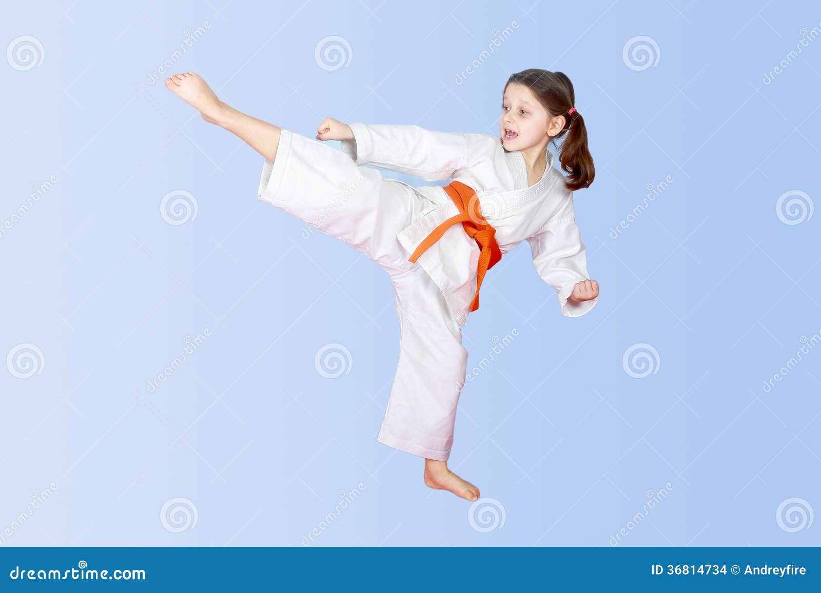On a Light Background Little Athlete Beat High Leg Kick Stock Photo ...