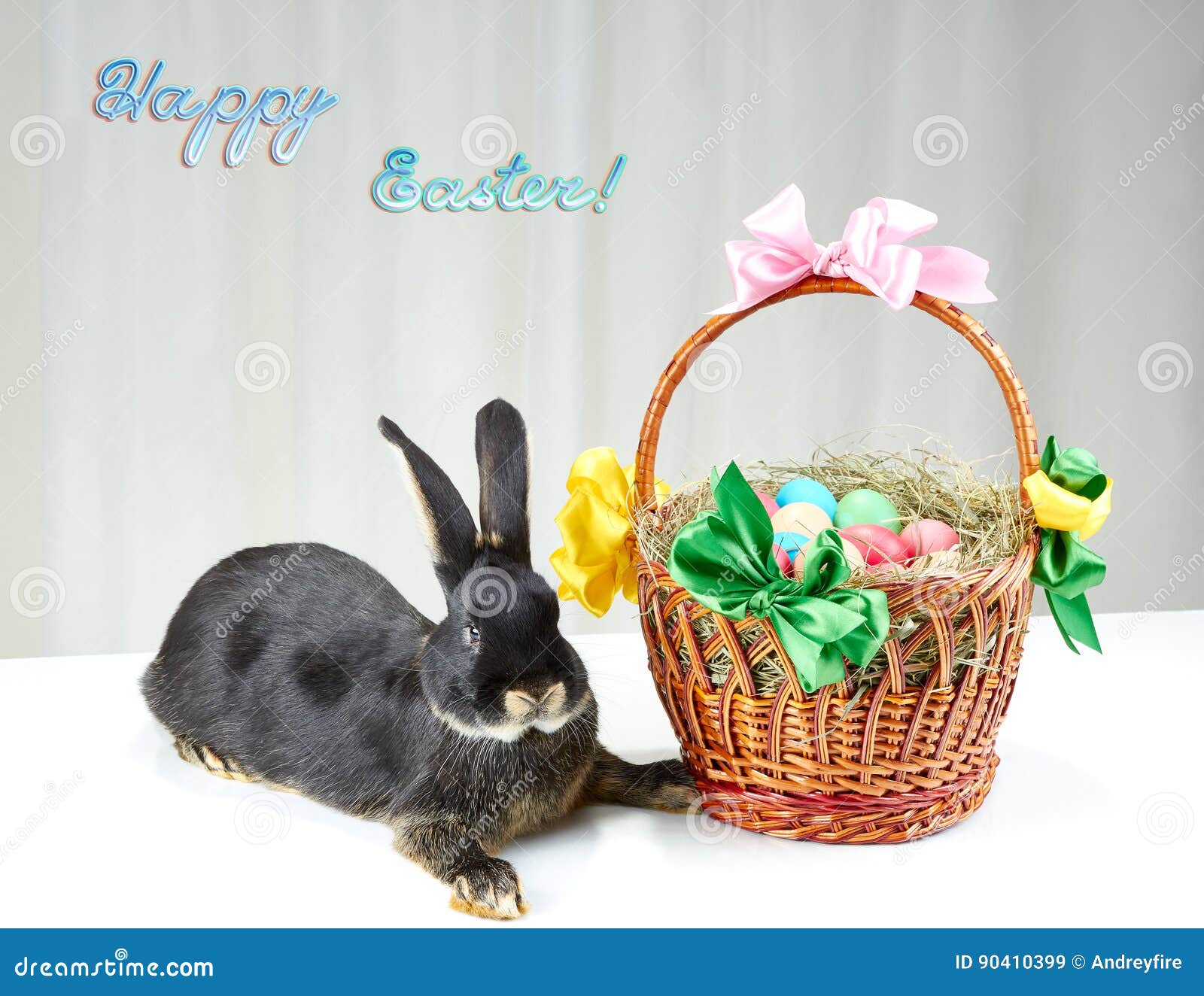 On a Light Background a Rabbit and a Decorated Basket Stock Image ...