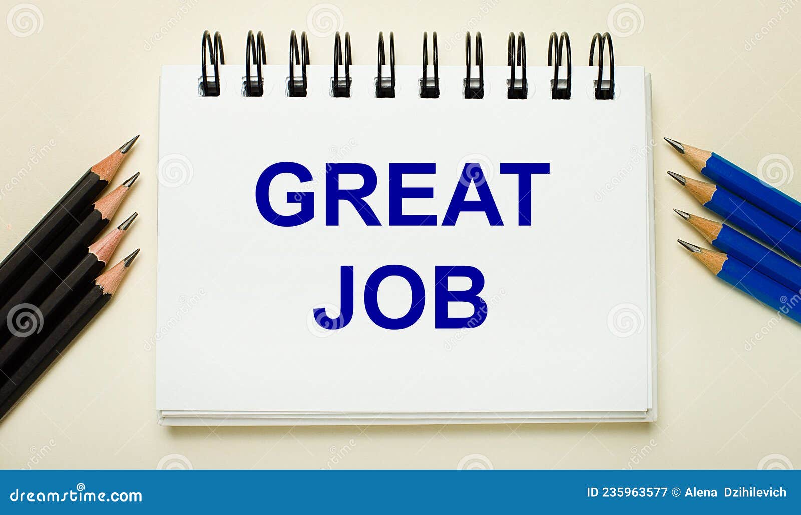 On a Light Background, a White Notebook with the Text GREAT JOB and ...