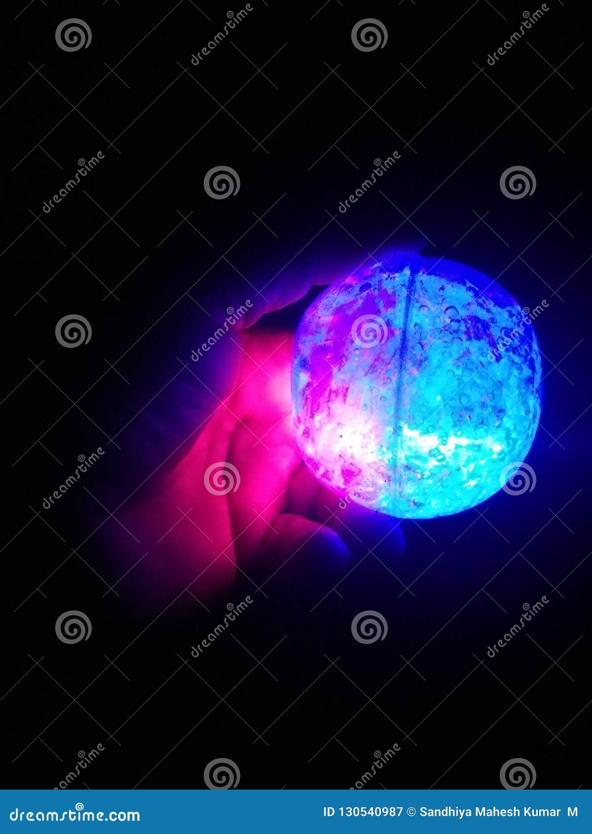 Light ball stock image. Image of hand, light, ball - 130540987