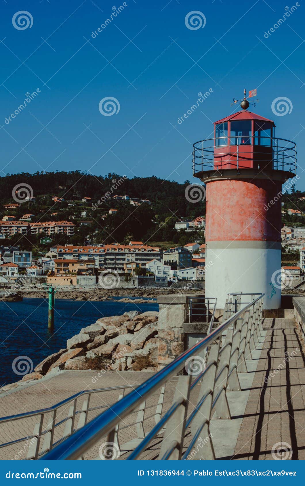Lighthouse on the beach stock photo. Image of white - 131836944