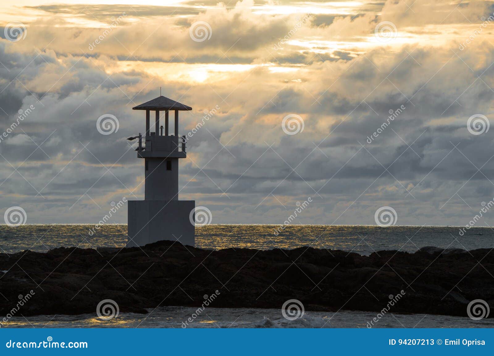 Light beacon at sunset stock image. Image of beautiful - 94207213