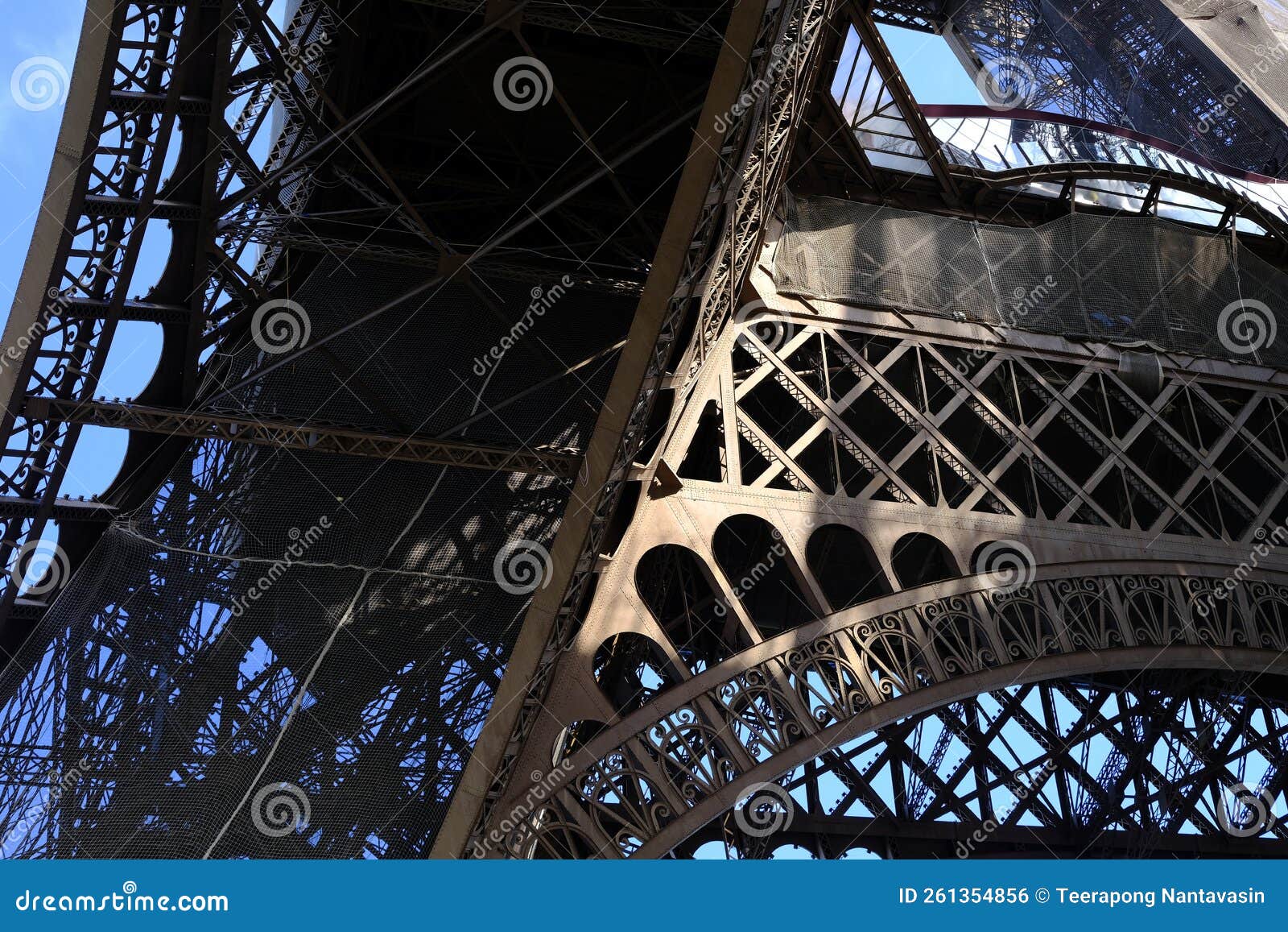 Light Beam on Gigantic Curve of Eiffel Tower. Stock Photo - Image of ...